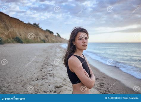 Brunette Tanned Girl In Swimwear Enjoying And Walking On Beach Stock