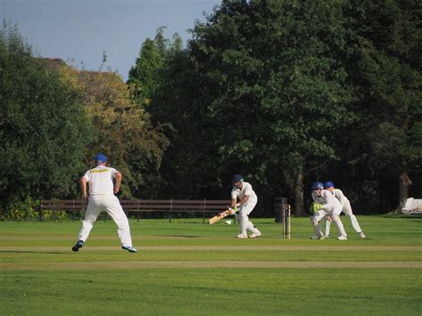 Download Cricket Teams In Motion Wallpaper