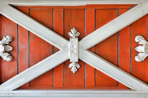 A White Gypsum Bas Relief Ceiling Featuring A Classic Architectural