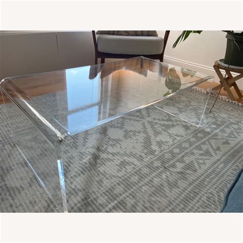 Cb2 Peekaboo Acrylic Coffee Table Aptdeco Cb2 Peekaboo Acrylic Coffee Table Aptdeco