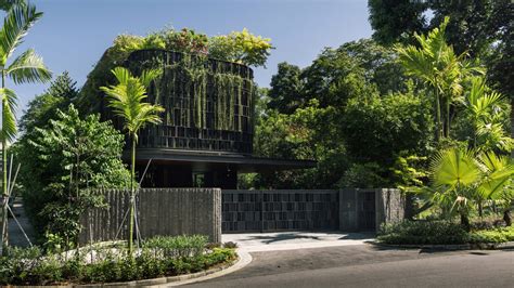 Plant Filled Timber Lattice Wraps Around Walls Of Singapore Home