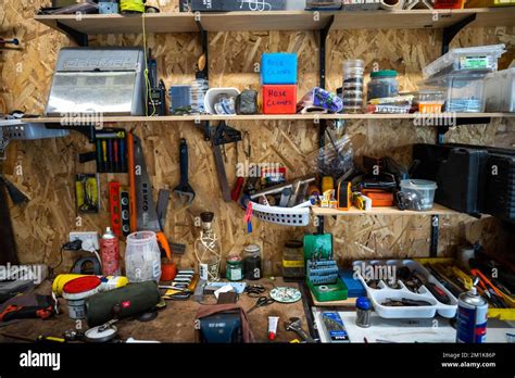 Female Working In A Tool Workshop Measuring Timber In Australia Stock Photo Alamy