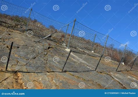 Reinforcing Slope With A Steel Net Anchored Deep Into Rock Stock Image