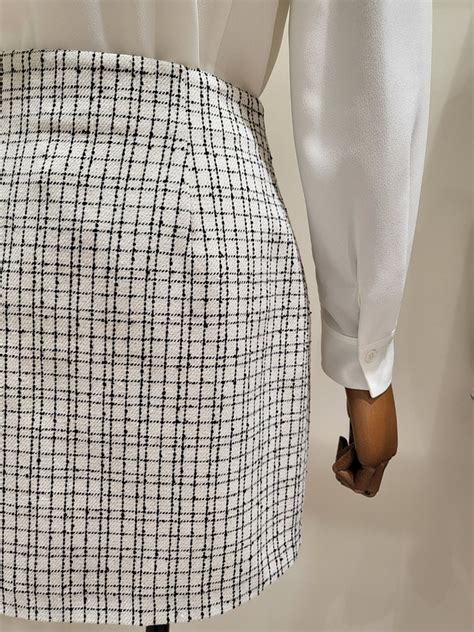 [케네스레이디] E509 에몬트 격자체크 트위드 스커트 Ewsknb4300