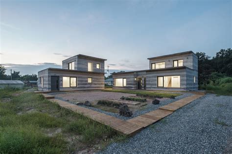 Stpmj Layers Concrete Mixes To Form Striped Walls At Stratum House