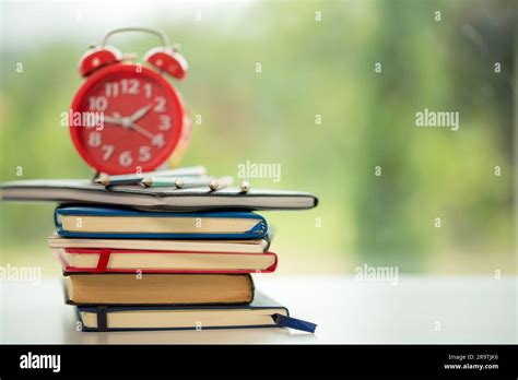Object Education Green Nature Background With Stack Of Ancient Books Or Old Bible Open Paper