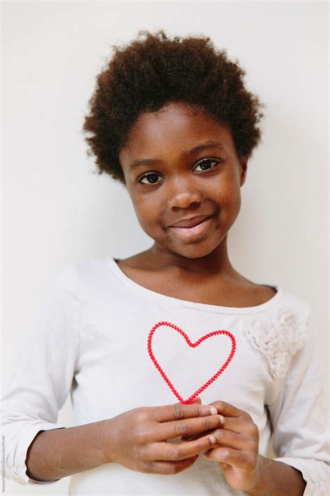 African American Girl With Big Heart For Valentines Day By Stocksy