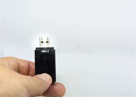 Human Male Hand Holding A USB Flash Memory On A White Background Stock Image Image Of Holding