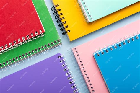 Premium Photo Colored Notebooks Colored Pencils On A Light Table Place For Your Text