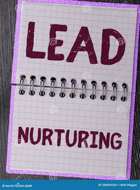 Hand Writing Sign Lead Nurturing Internet Concept Method Of Building A