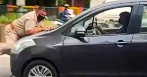Cop Dragged On Vehicles Bonnet For 25 Km In Gujarat