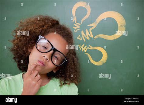 Cute Pupil Thinking Against Digital Composite Image Of Yellow Light