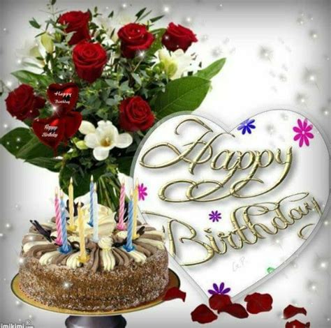 Birthday Cake With Candles And Flowers