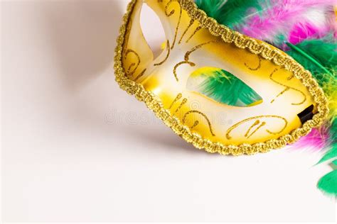 Composition Of Colourful Mardi Gras Carnival Mask With Feathers On