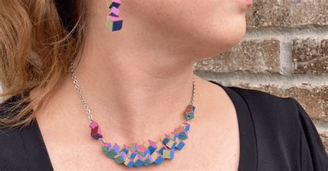 geometric cubic statement necklace and earrings by penolopybulnick