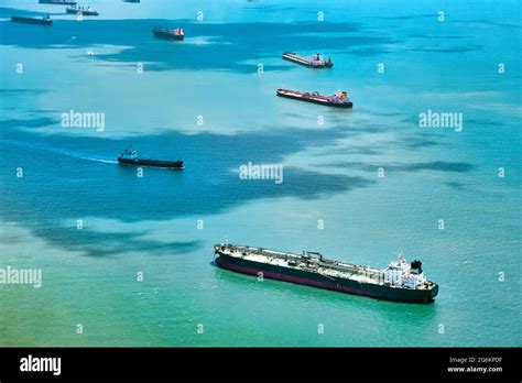 Aerial View Of Container Ships In Singapore Strait Airplane Shot Cargo Ships Anchored In The