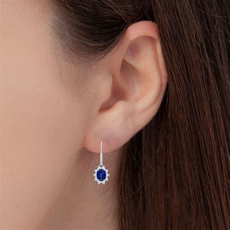 Purchase Oval Cut Blue Sapphire Dangling Gem Stone Earrings 260