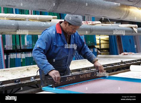 Man Screen Printing In Textiles Factory Stock Photo Alamy
