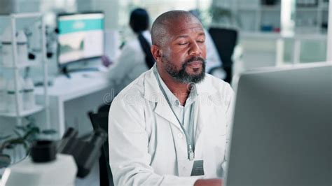 Science Laboratory And Black Man With Computer Thinking And Research On Report In Medical