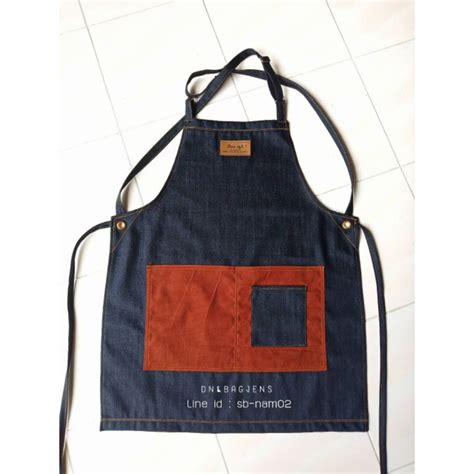 พรัอมส่ง ผ้ากันเปื้อนยีนส์ สายไขว้หลังปรับสายได้ แต่งกระเป๋าทูโทนแคนวาส ช่องใหญ่ Shopee Thailand