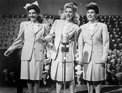 Download The Andrews Sisters Performing Live In 1944 Wallpaper