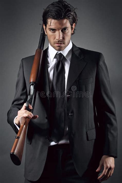 Man Holding Gun Pose Hot Sex Picture