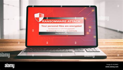 Ransomware Virus Attack Alert On A Computer Laptop Screen Wooden Desk Blur Office Background