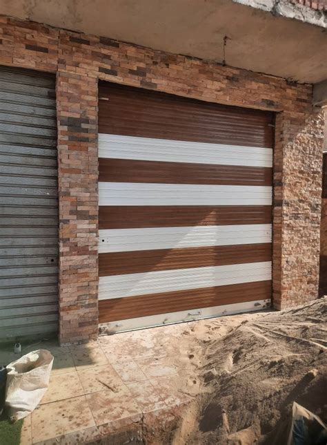 🚦اولادسعيد🚦اخر اعمالنا بمدينة العاشر من رمضان ابواب صاج للمحلات التجارية و الجراچات والمعارض