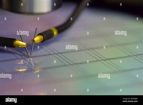 Close Up Of Examining A Sample Of Microchip Transistor With Probe Station Under The Microscope