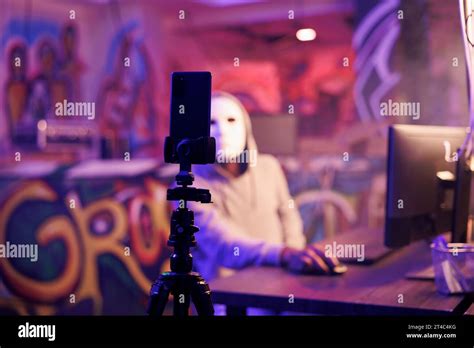 Anonymous Criminal Recording Scam On Smartphone Camera In Abandoned