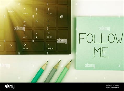Sign Displaying Follow Me Word Written On Inviting A Person Or Group