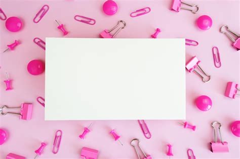 Premium Photo White Blank Horizontal Paper Card Against Paper Clips
