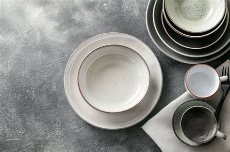 Ceramic Tableware On Grey Background Various Types Of Dishes Bowls