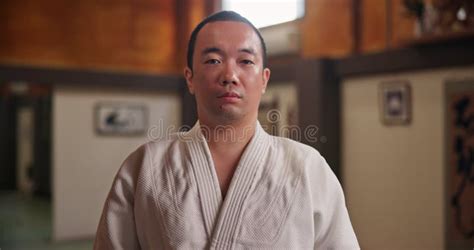 Face Confident Asian Man Or Bow In Dojo For Respect Karate Practice
