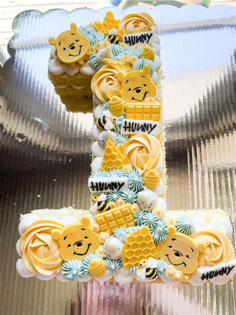 Winnie The Pooh Cupcakes And Celebration Cake Artofit