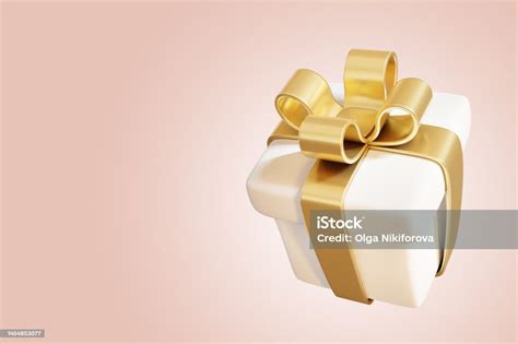 베이지색 파스텔 배경에 황금 활 리본이 있는 흰색 선물 상자 크리스마스 새해 생일입니다 3d 렌더링 0명에 대한 스톡 사진 및 기타 이미지 Istock
