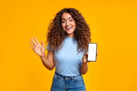 Woman Showing Phone Screen With A Happy Gesture Stock Image Image Of