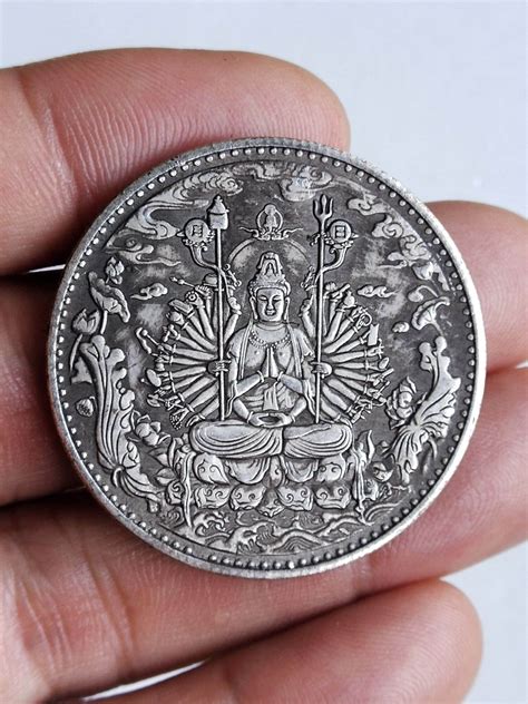 เหรียญเจ้าแม่กวนอิม ปางพันมือ ด้านหลังมนต์นะโมกวนซีอิม Narathipkiller321 Thaipick