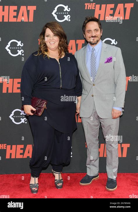 Actress Melissa Mccarthy And Husband Actor Ben Falcone Attend The Heat