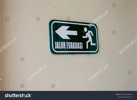 Evacuation Safety Sign Emergency Exit Door Stock Photo 2127459077 Shutterstock