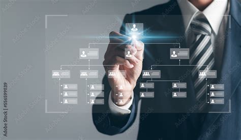 Businessman Touching Organization Chart On Virtual Interface Screen