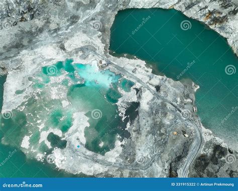 Open Pit Mine Industry Limestone Quarry With Backhoe And Truck In Operation Heavy Machinery In