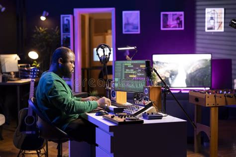 Audio Composer Playing Piano Electronic Keyboard To Create A New Track