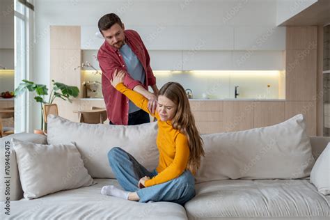 Tense Moment Married Couple As Engage In Heated Argument With Faces Filled With Frustration