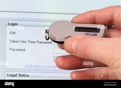 Man Uses Secureid Token To Log Into A Website Needing A Userid