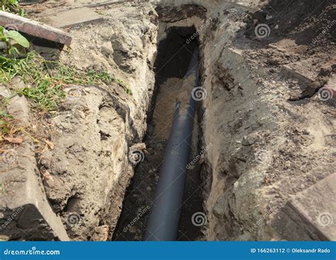 Installing Sewer Pipe In The Ground Trench House Sewer Drain Pipe