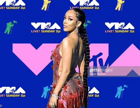 Doja Cat Commands Attention In The Ultimate Naked Dress And Thong At
