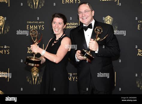 Alana Billingsley And Joe Celli Pose For A Portrait With Their Awards