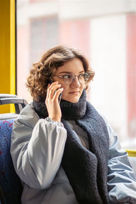 A Female Student Rides Public Transport Public Transportation And People Concept Stock Photo
