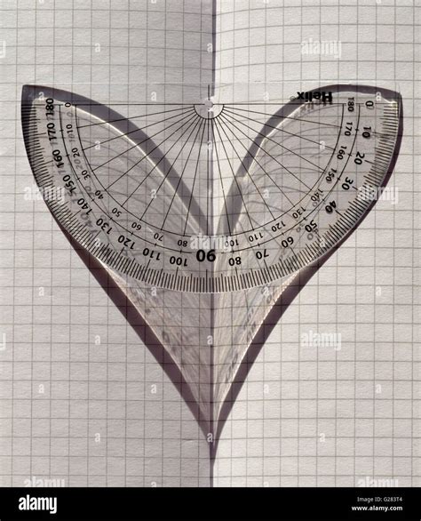 Love Maths A Protractor In Sunlight On Folded Graph Paper The Shadow